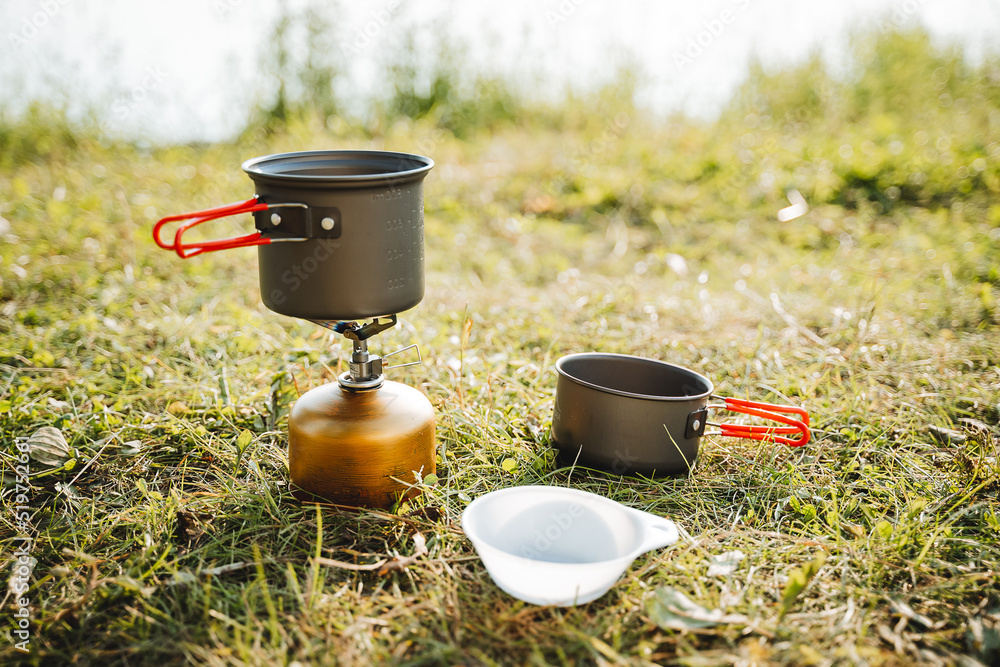 A set of dishes for a tourist on a hike, compact equipment, a small ...