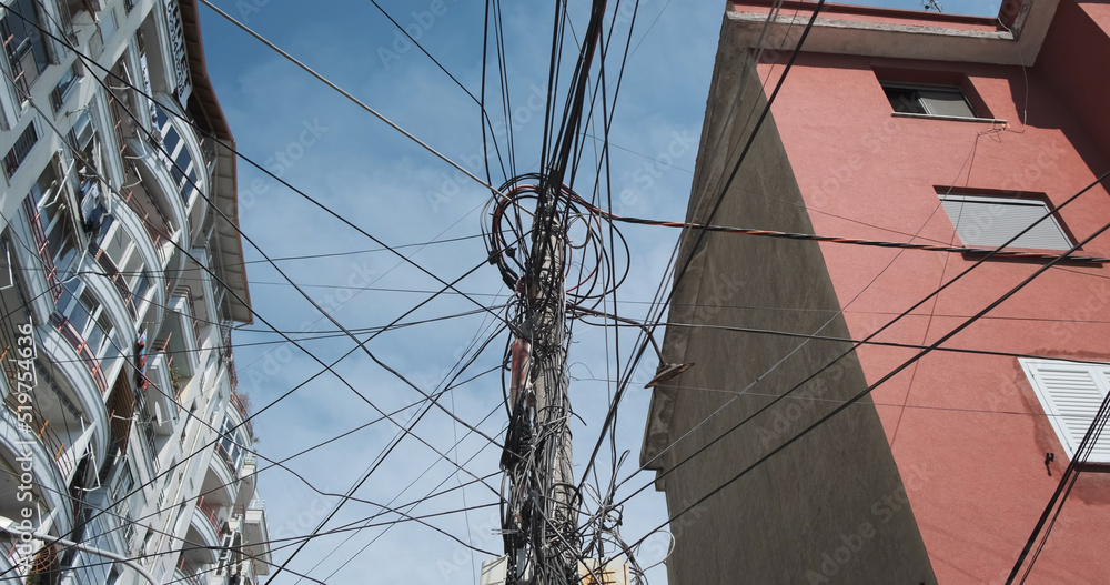 Tangled electricity fiber optic cables in communication systems ...