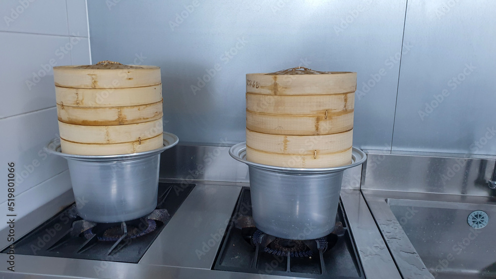 Cooking in a traditional Korean traditional bamboo steamer Stock Photo ...