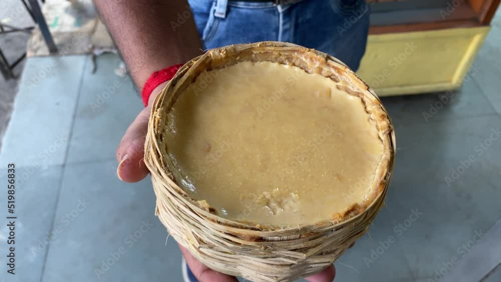 Top angle shot of Bengali Sweet Curd (Misti Doi) served in traditional ...