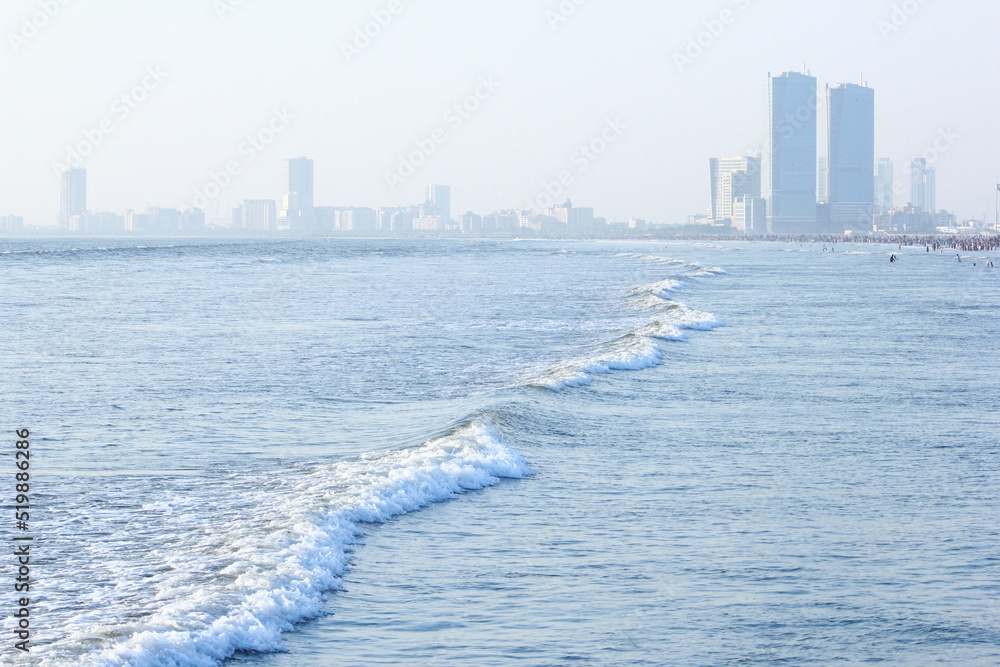 Photo & Art Print A beautiful picture of seaview wave with buildings karachi sindh