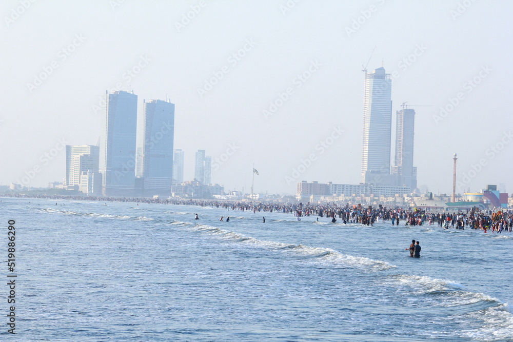 A beautiful picture of seaview wave with buildings karachi sindh ...