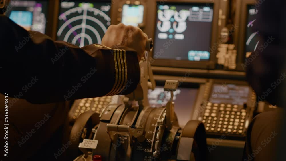Aircraft captain in cockpit command taking off with airplane ...
