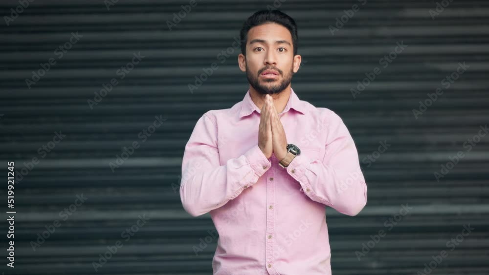Shocked, surprised and stressed man praying with a look of fear and ...