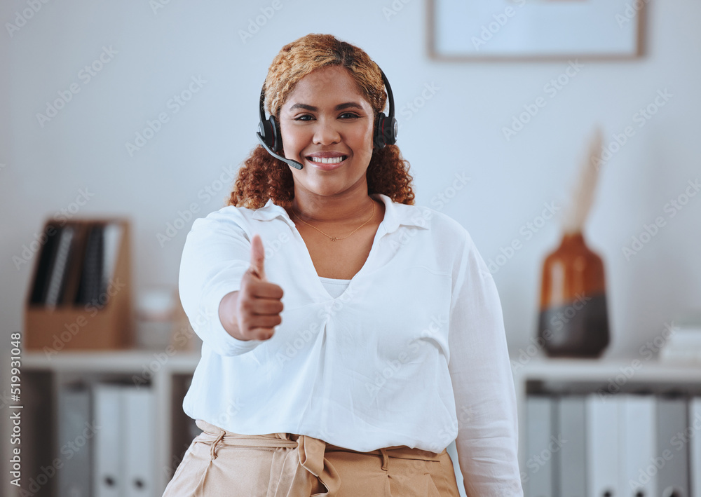 Thumbs up from happy call center agent wearing a headset and smiling in ...