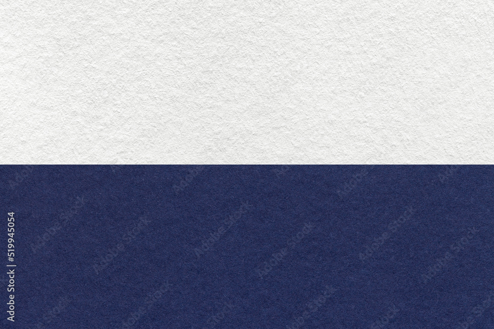 Texture of craft white and navy blue paper background, half two colors ...
