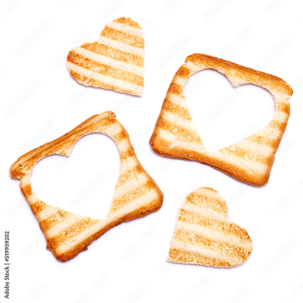 Toasted bread with grill marks and heart shaped hole isolated on white ...