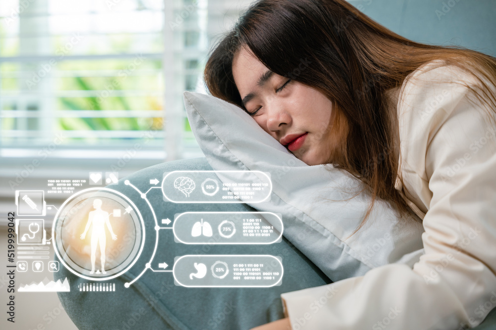 Tired woman sleeping closed eyes on sofa in living room at home after ...