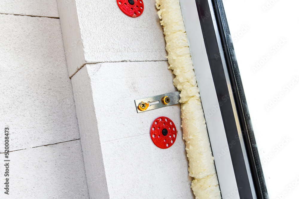 Insulation of window openings with polyurethane foam. Construction of a ...