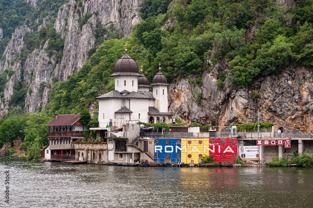 As you cruise through the Iron Gate of the Danube, you see this old ...