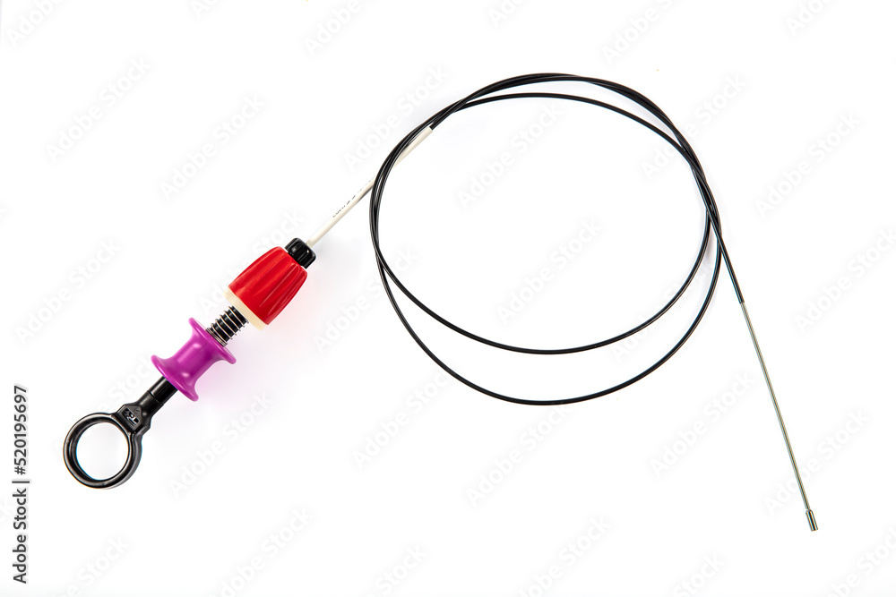 A balloon inflation device used in angioplasty procedure. Mesh metal ...