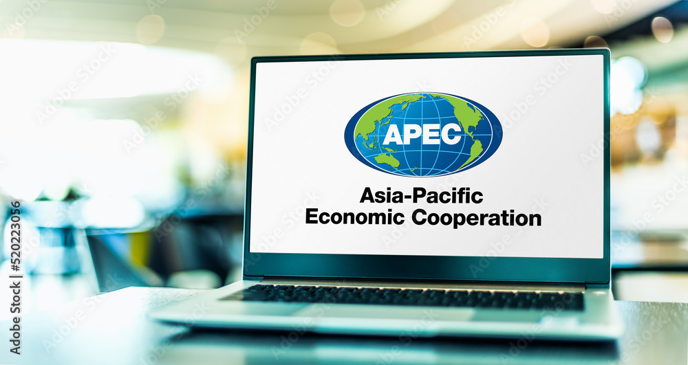 Laptop displaying logo of The Asia-Pacific Economic Cooperation ภาพถ่าย ...