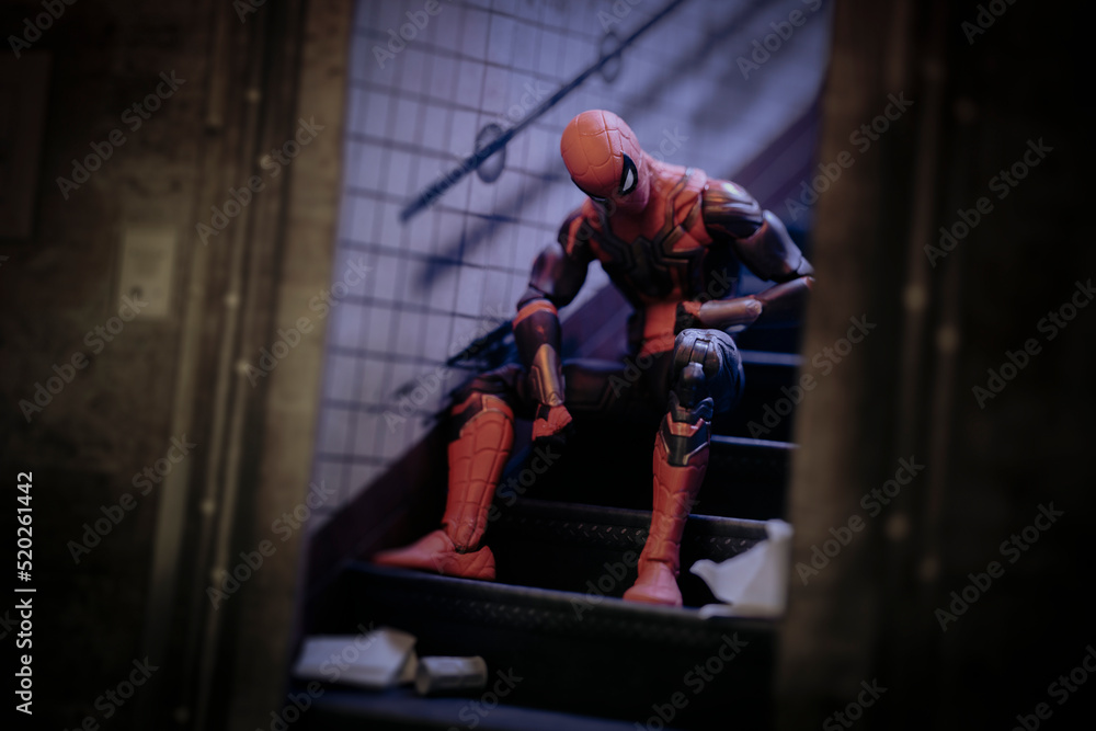 NEW YORK USA, JULY 31 2022: Marvel comics superhero Spiderman sitting ...