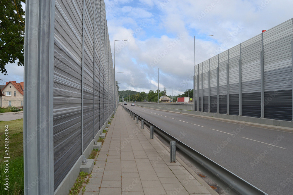 A noise barrier (also called a soundwall, noise wall, sound berm, sound ...