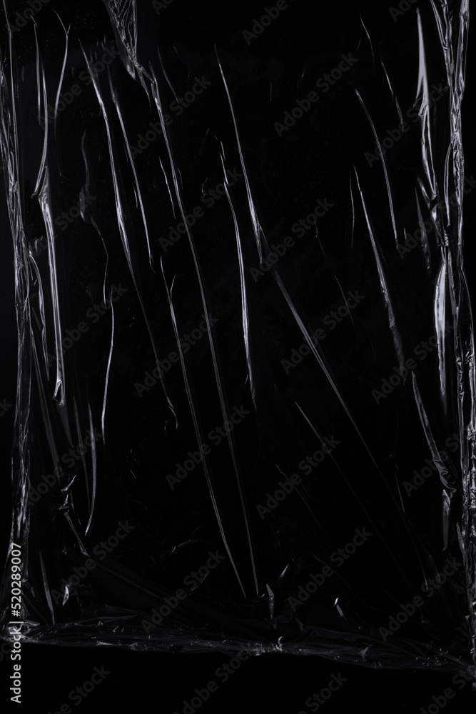 Black transparent plastic wrap texture overlay background. Realistic ...