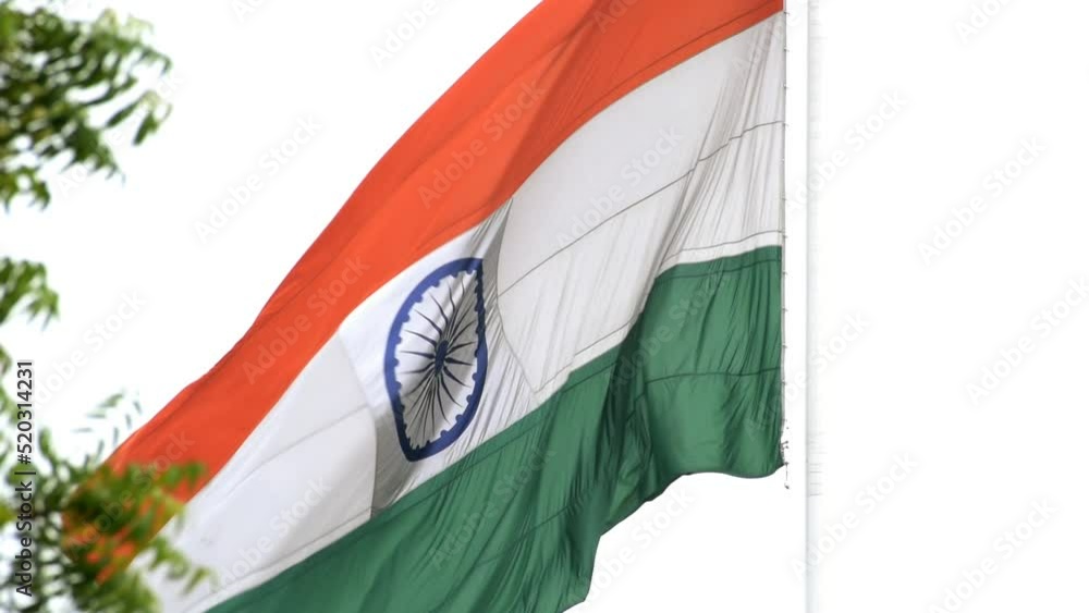 India flag flying high at Connaught Place with pride in blue sky, India ...