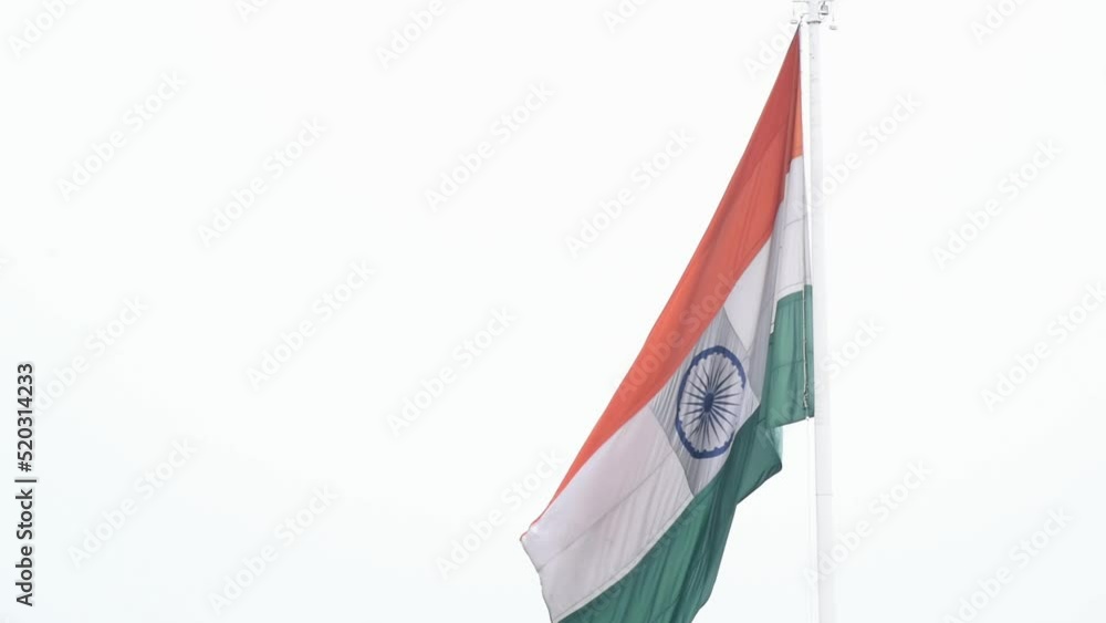India flag flying high at Connaught Place with pride in blue sky, India ...