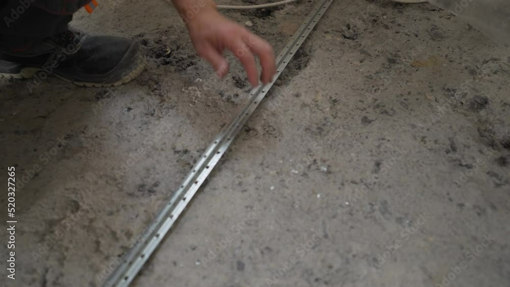 Floor repair, installation of guides for concrete screeds. Installation ...