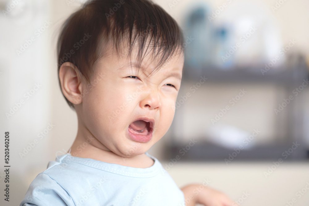 Foto de moody emotional tantrum and angry baby girl .Attention deficit ...