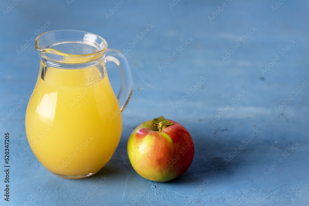 Jug of Apple Juice with Pulp on Blue Background Raw Red Appe Rustic ...