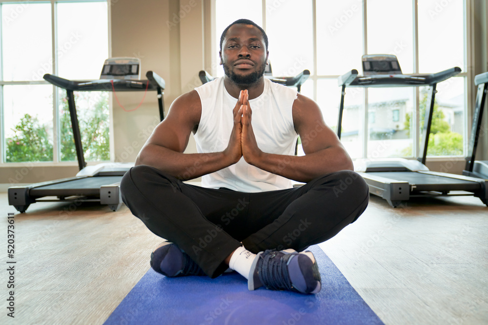 African american male practice on yoga class in sport club with lotus ...
