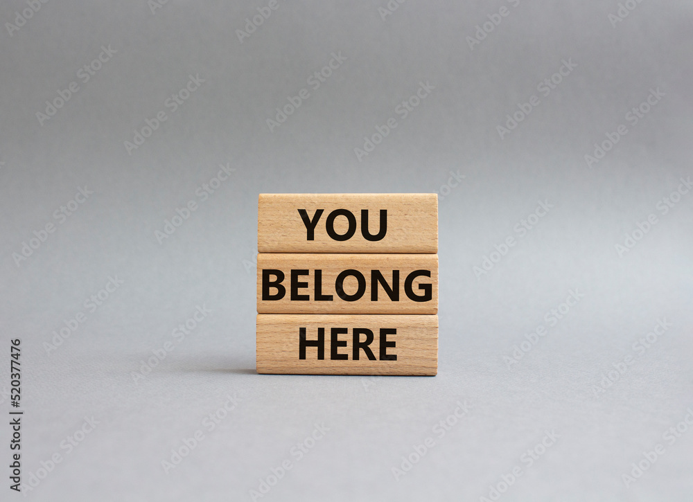 You belong here symbol. Wooden blocks with words You belong here ...