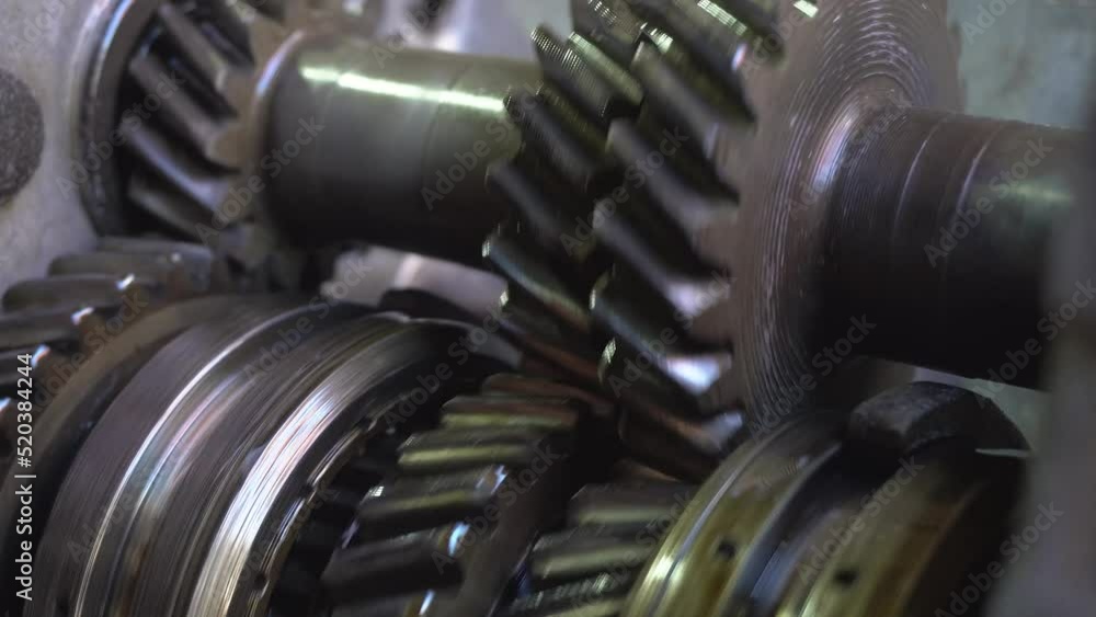 Cross section of a car gearbox. Gearbox close-up. Gears at work ...