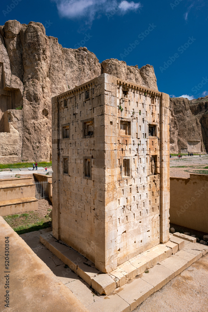 Sandstone rock with carved tombs of persian kings in Necropolis, Iran ...