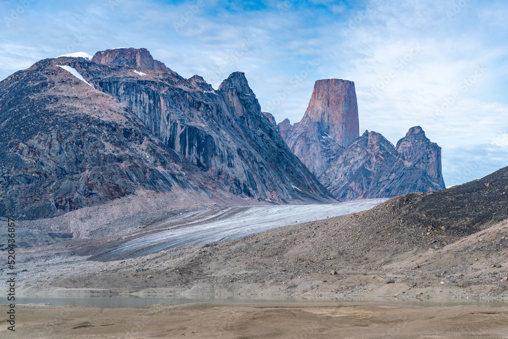 Iconic granite rock of Mt.Asgard towers above Turner glacier in remote ...
