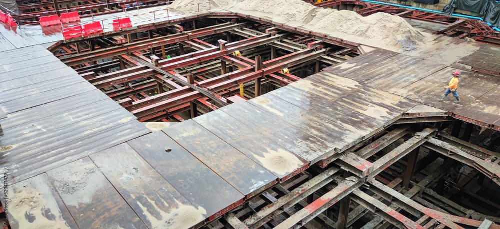 Building construction site in the city. Underground foundation for high ...