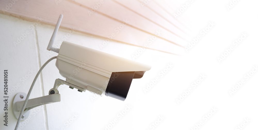 CCTV IP Camera wireless on house wall with copy space, security outdoor ...
