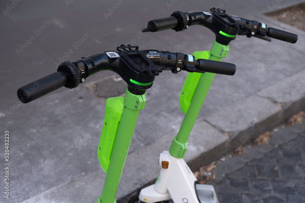 ROME, ITALY - JULY 16 2022: Close-up of the handlebar with QR code ...