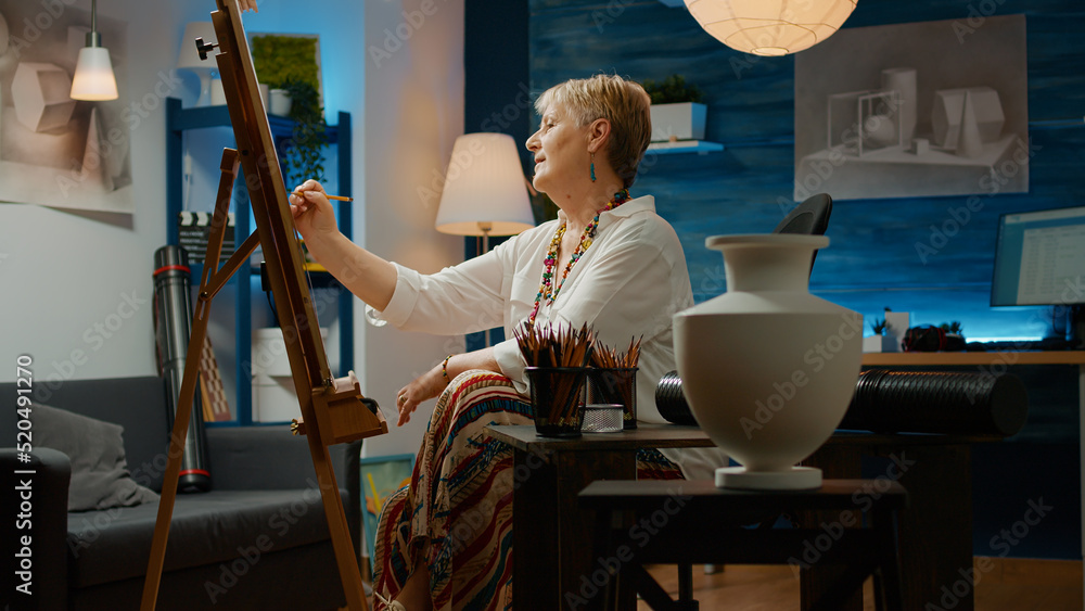 Creative person looking at vase design to draw model for hobby, drawing ...