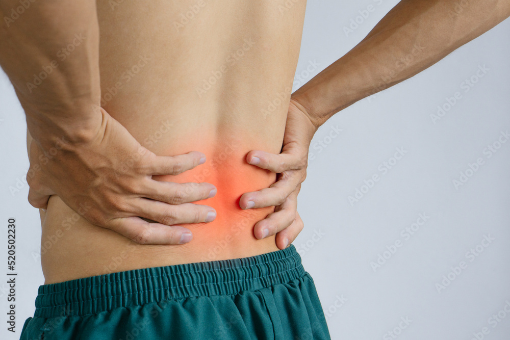 Man holding his back in pain.Back pain.Office syndrome, Backache and ...