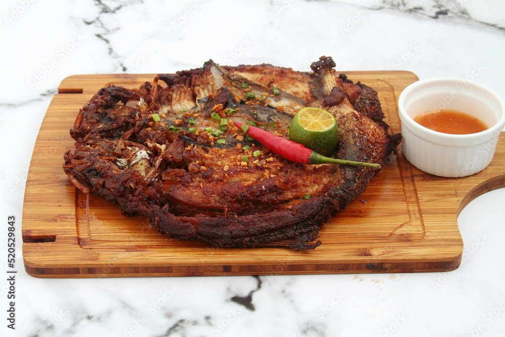 Freshly cooked Fried Boneless Bangus or fried boneless milkfish Stock ...