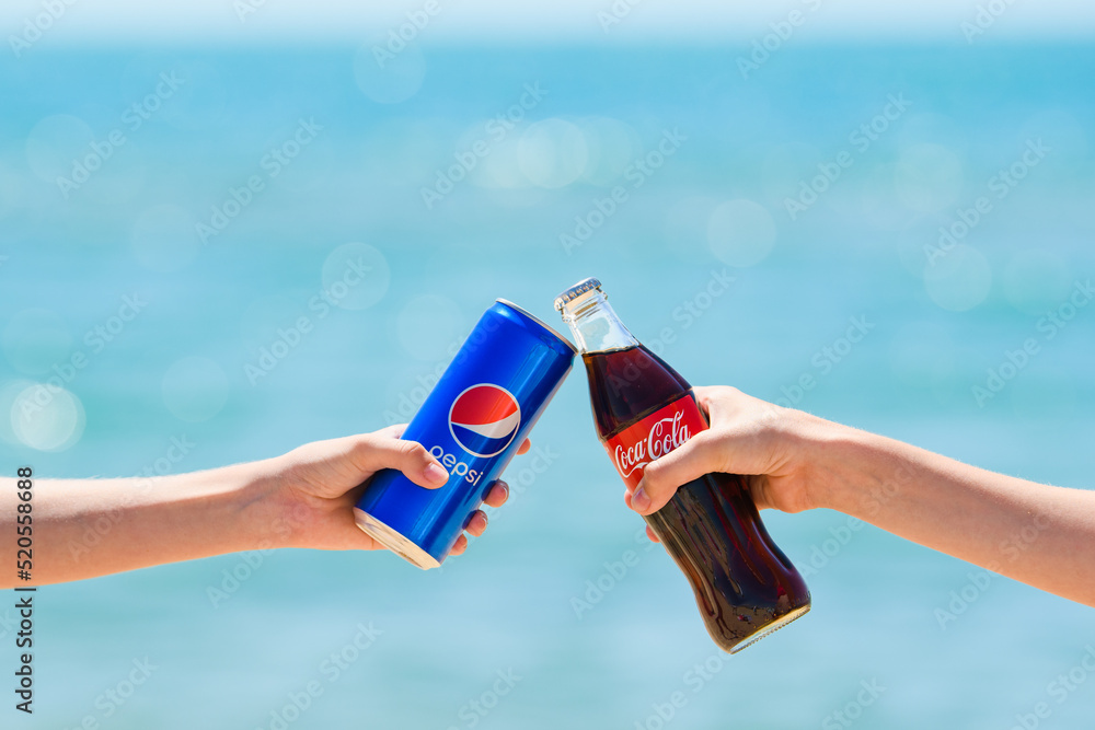 Anapa, Russia - July 2022: Two cans of Coca-Cola and Pepsi Cola in the ...