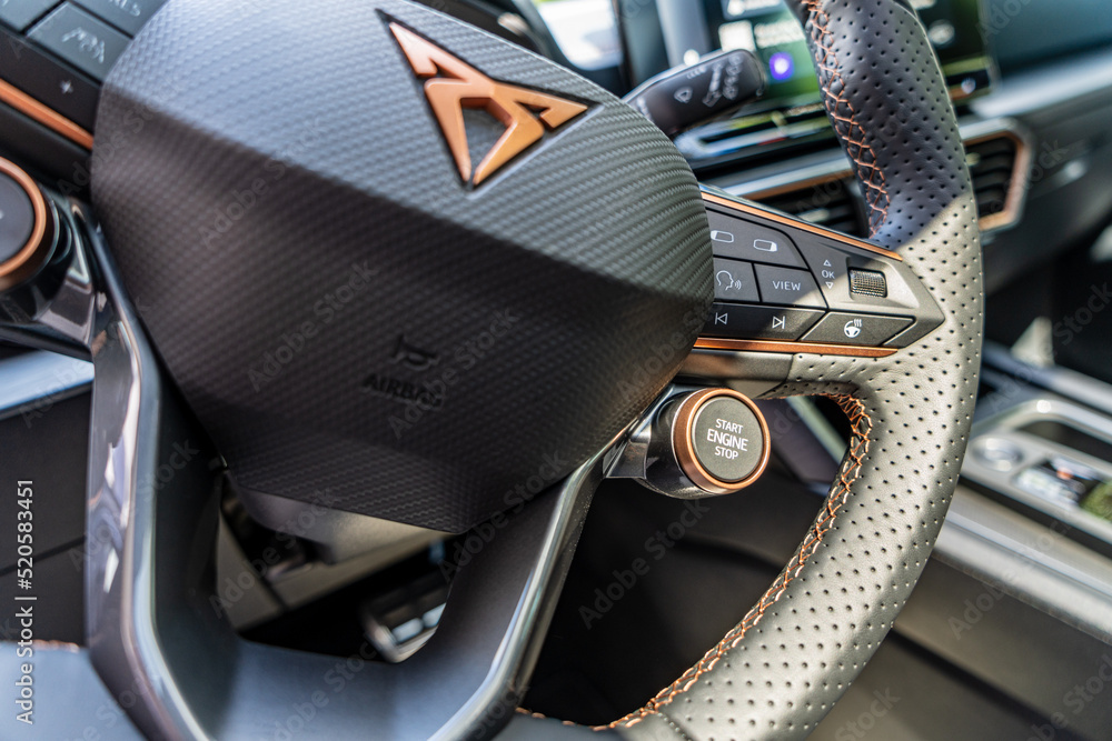 Start stop button on the steering wheel of a CUPRA car Stock Photo ...