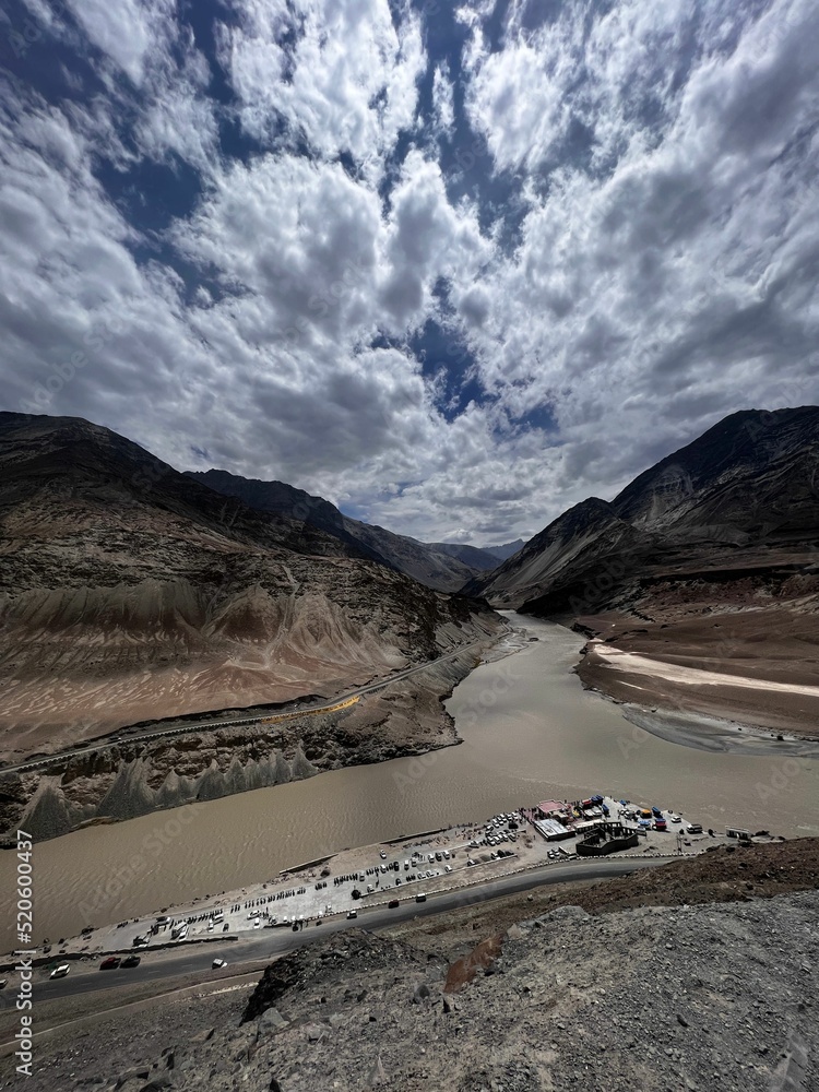 Vertical shot of the confluence of Indus and Zanskar rivers in Nimmoo ...