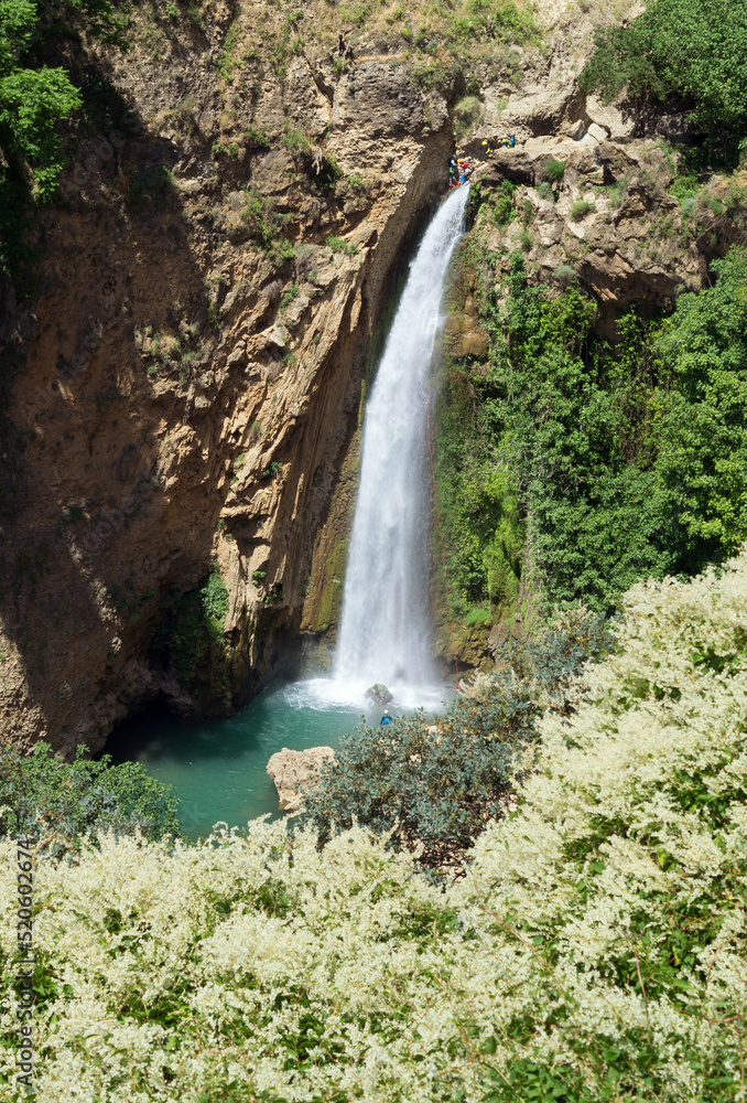 Groups of people canyoning in the Tajo de Ronda canyon (Malaga, Spain ...