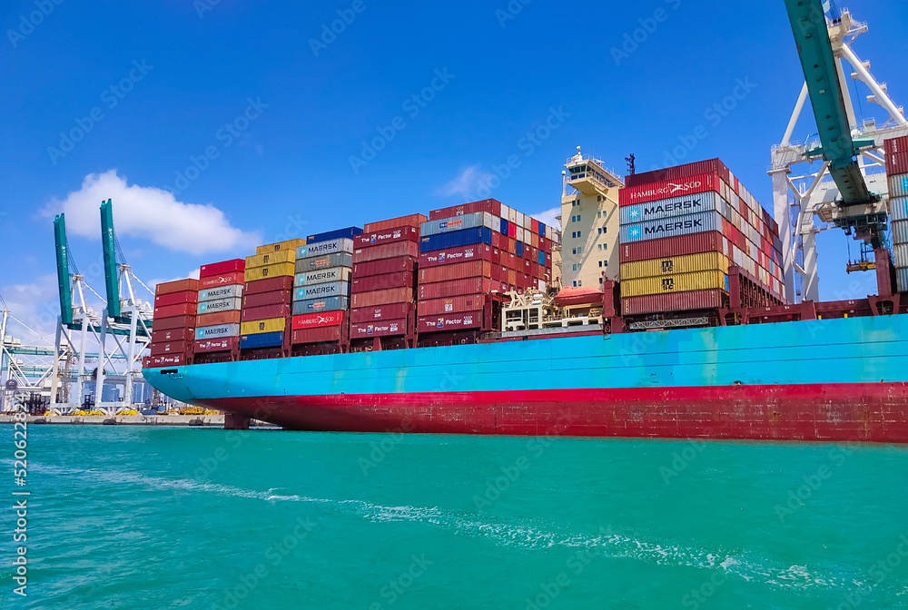Container ship at Port Miami, one of the largest cargo ports in the US ...