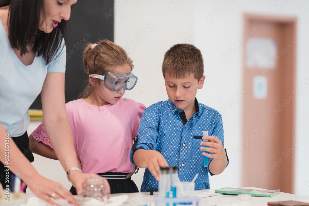 Elementary School Science Classroom: Enthusiastic Teacher Explains ...