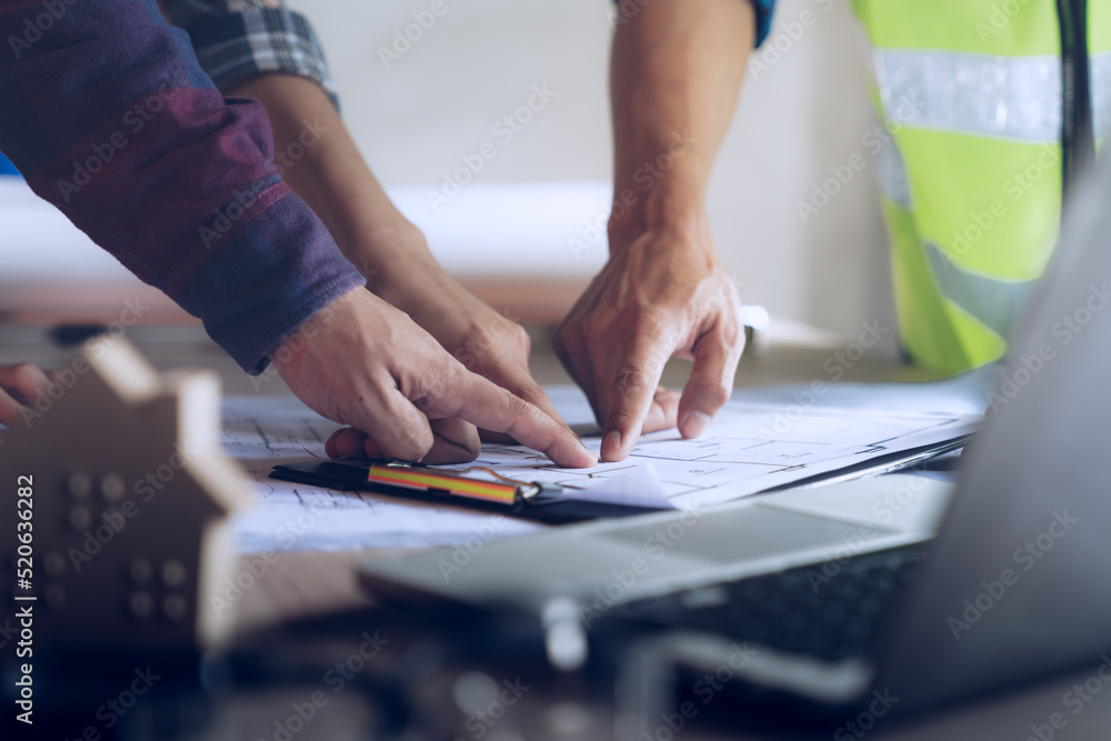 Architect & Engineer working drawing document about project planning ...