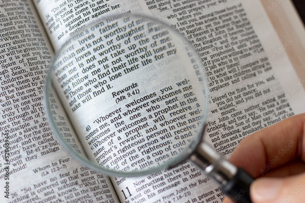 Scripture verses for faithful Christian rewards in an open Holy Bible ...