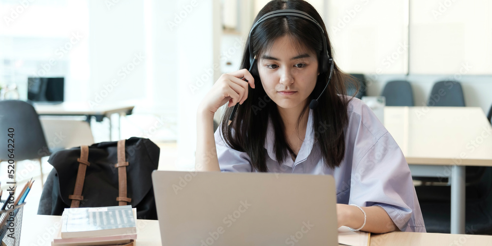 Homeschool Caucasian cute young girl student learning virtual internet ...