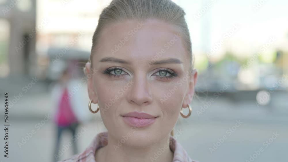 Close up of Young Woman Face Looking at the Camera Outdoor Stock Video ...