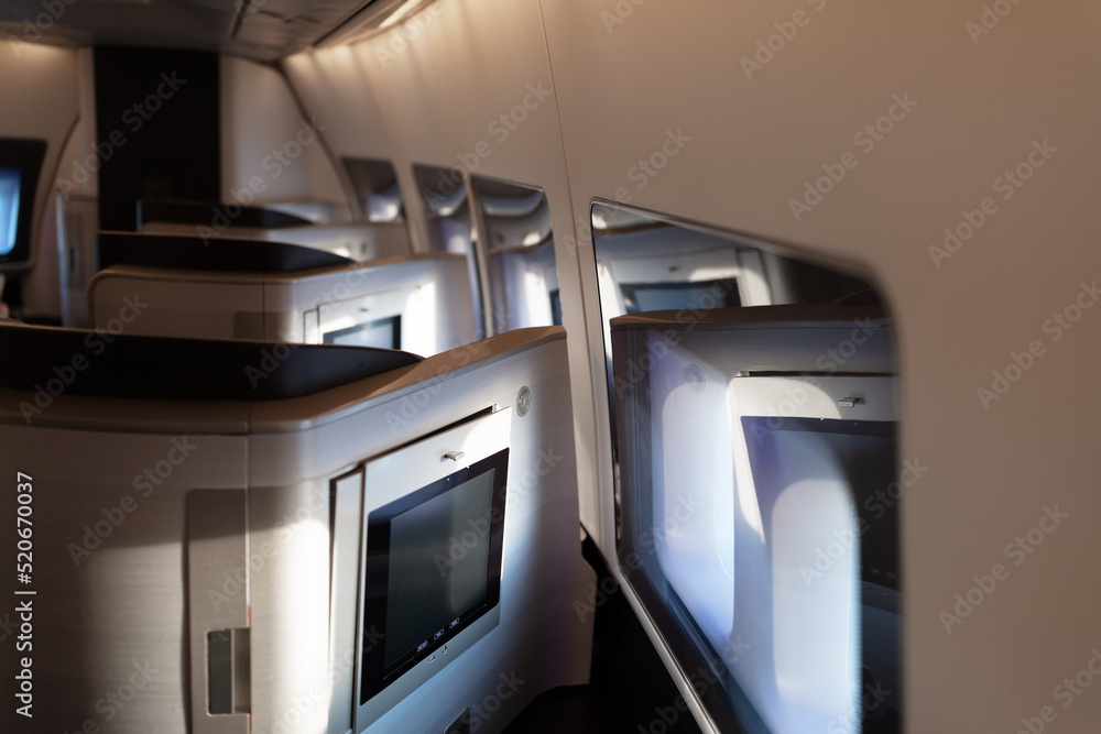 Airplane cabin first class interior view Stock Photo | Adobe Stock