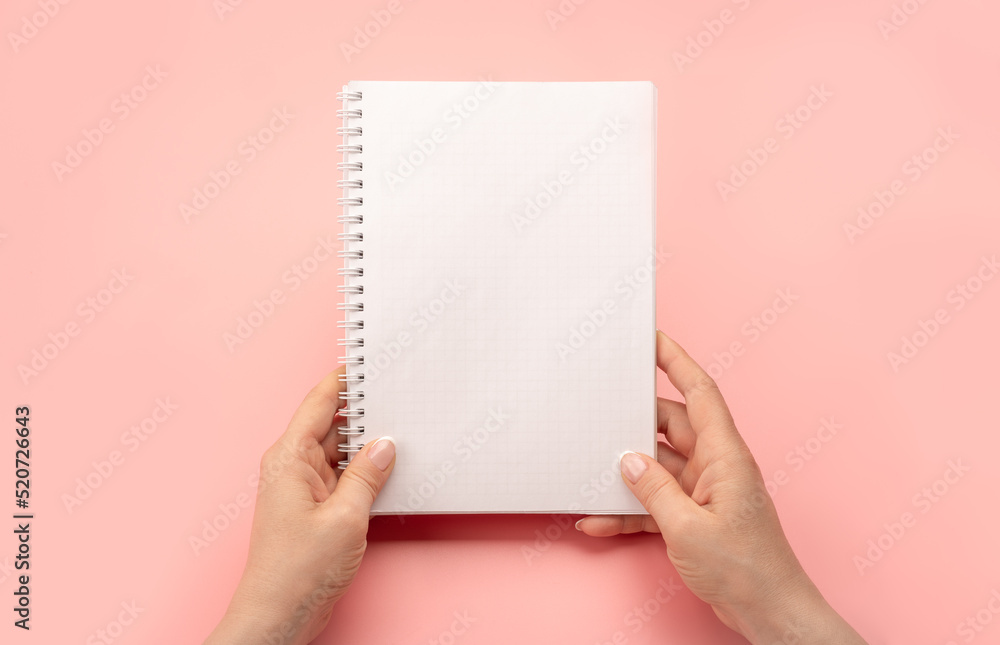Notepad mockup. female hands holding blank spiral notepad or calendar ...