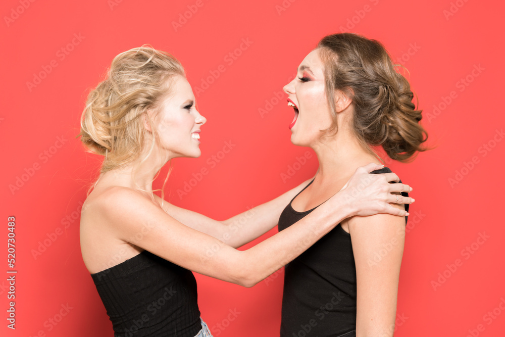 Two girls swear in the studio. One of them is screaming. Emotions ...