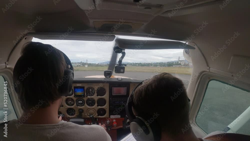 Flight Instructor And Student Pilot In The Cockpit Of A Cessna Aircraft ...