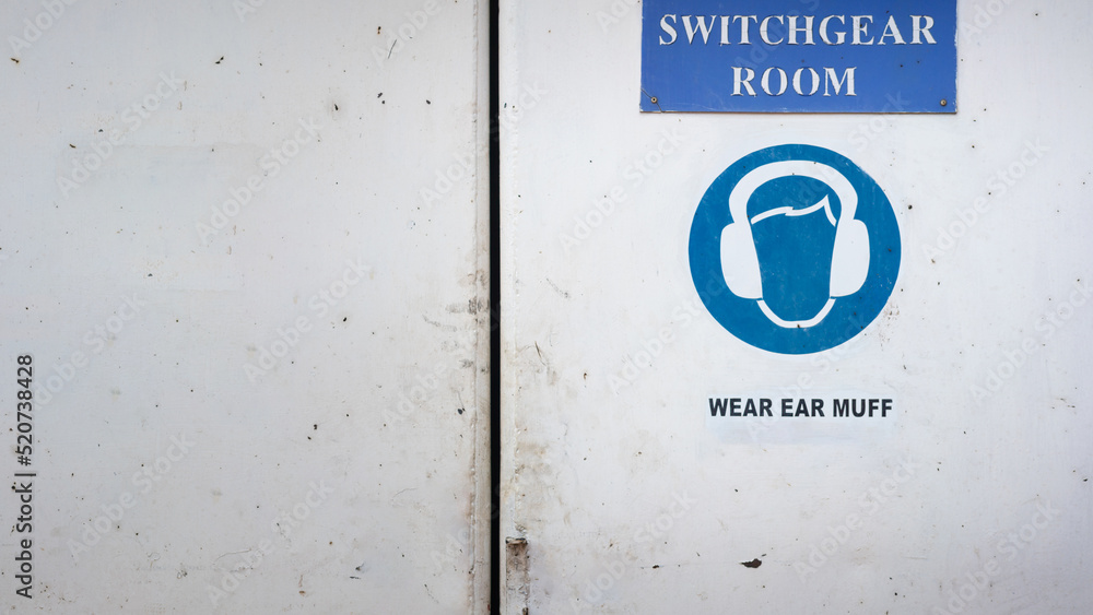 Caution sign to wear ear muff, the sound protective PPE which is showed ...